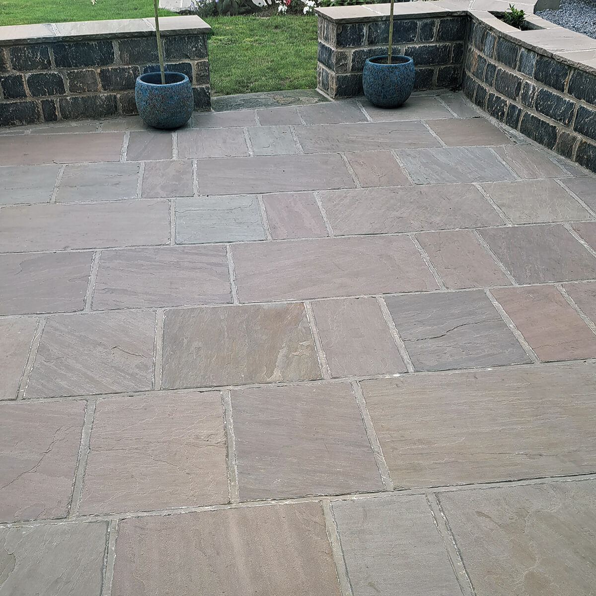 Tudor Brushed Sandstone Outdoor Paving Slabs | StoneSuperstore