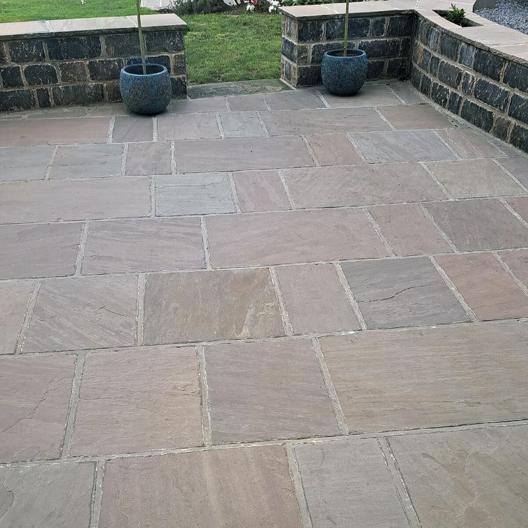 Tudor Brushed Sandstone Outdoor Paving Slabs | StoneSuperstore